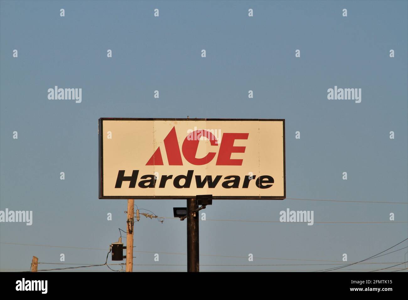 Ace Hardware Advertisement sign with blue sky Stock Photo - Alamy