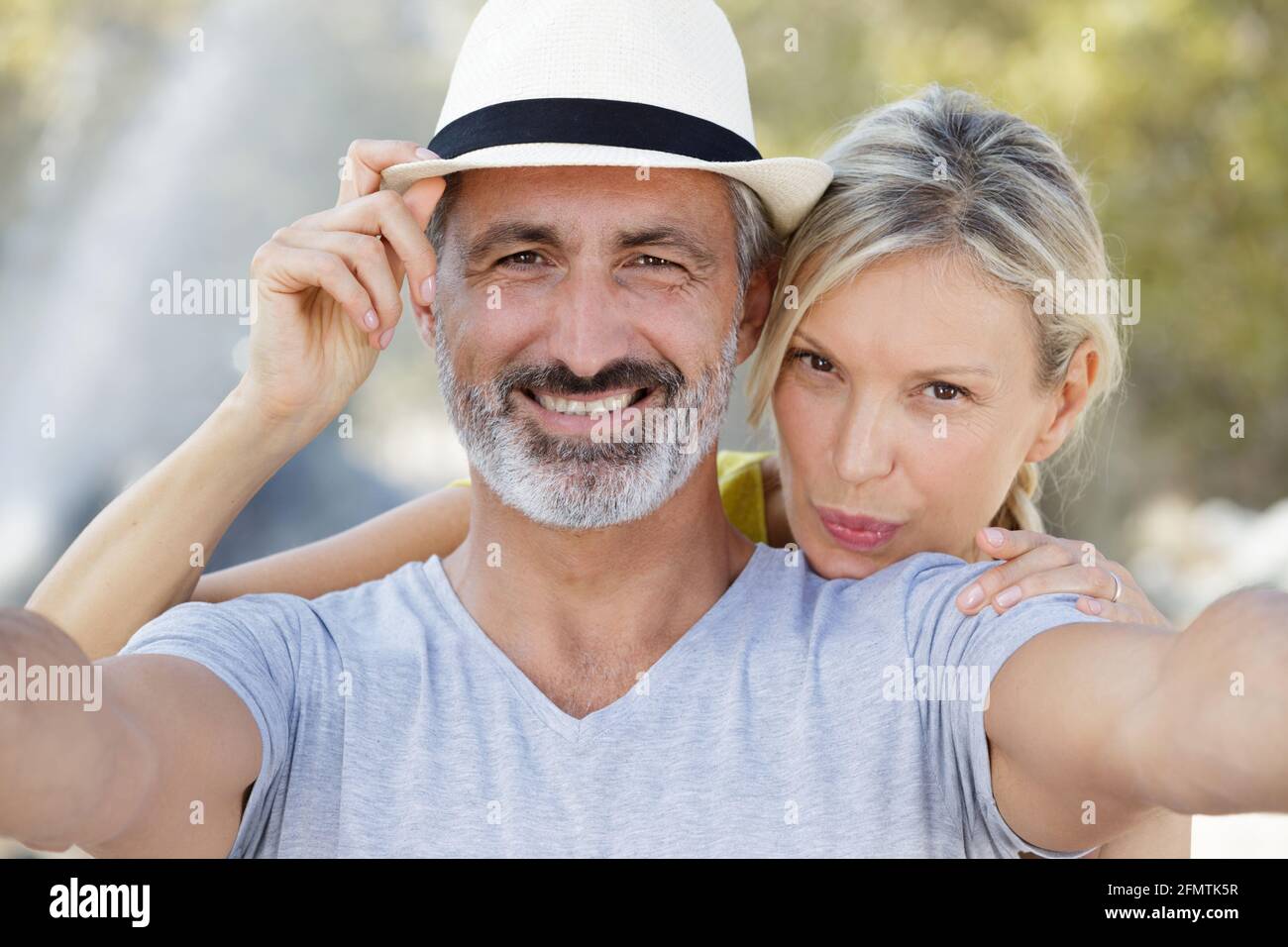 Woman cuddles man hi-res stock photography and images - Alamy