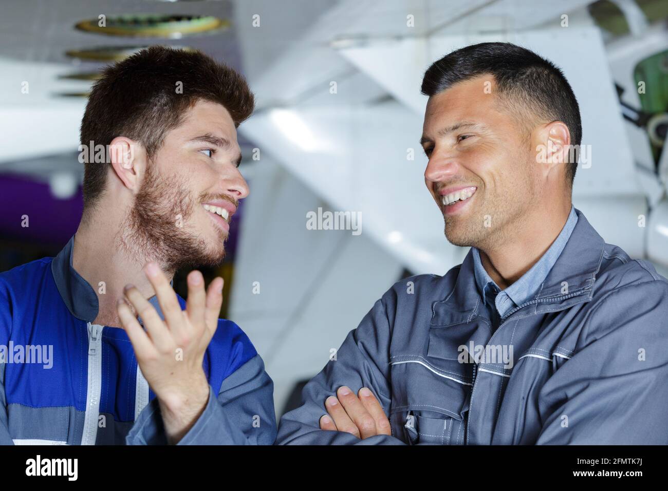 Workers laughing hi-res stock photography and images - Alamy
