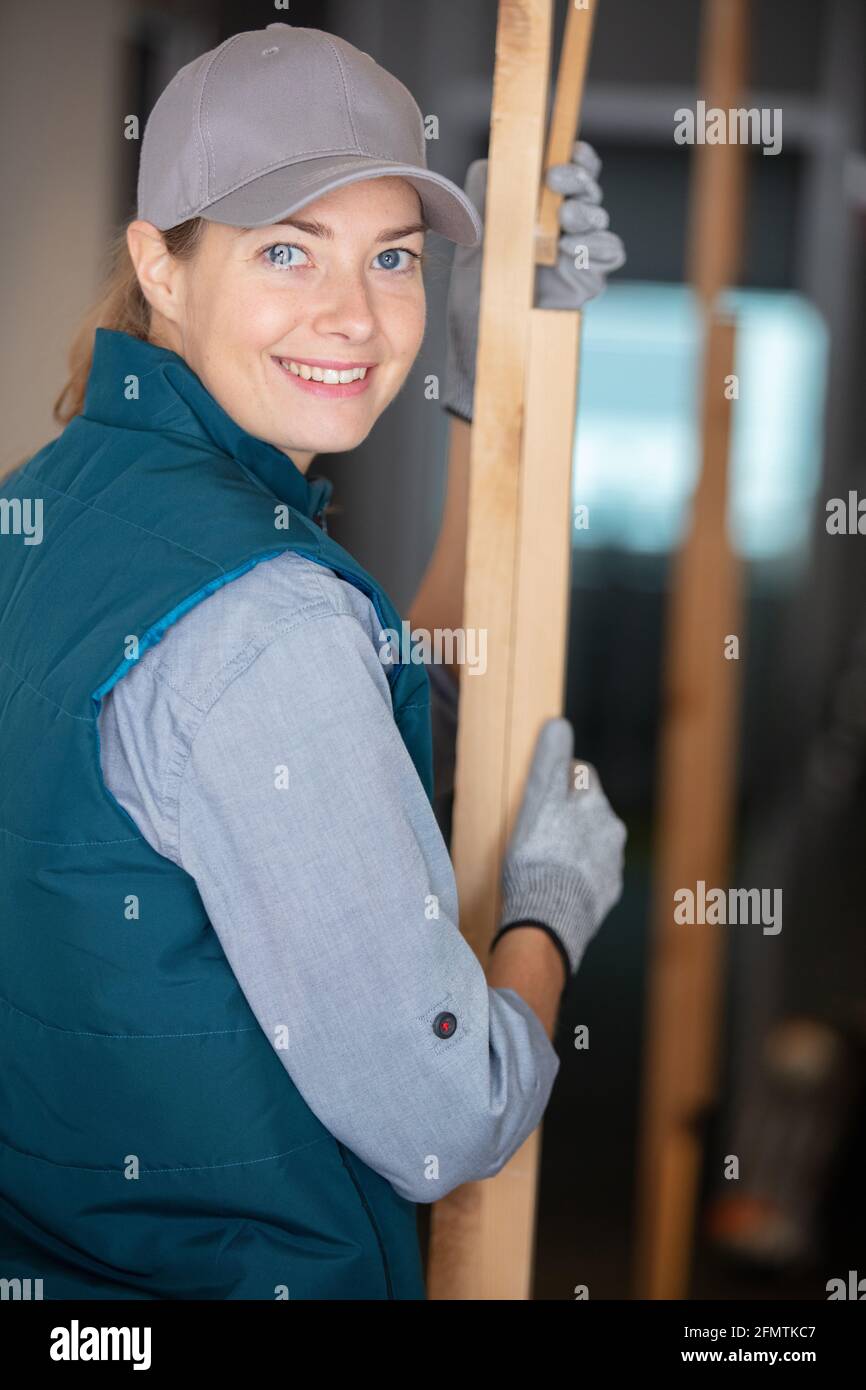Beautiful female carpenter woodshop hi-res stock photography and images - Alamy