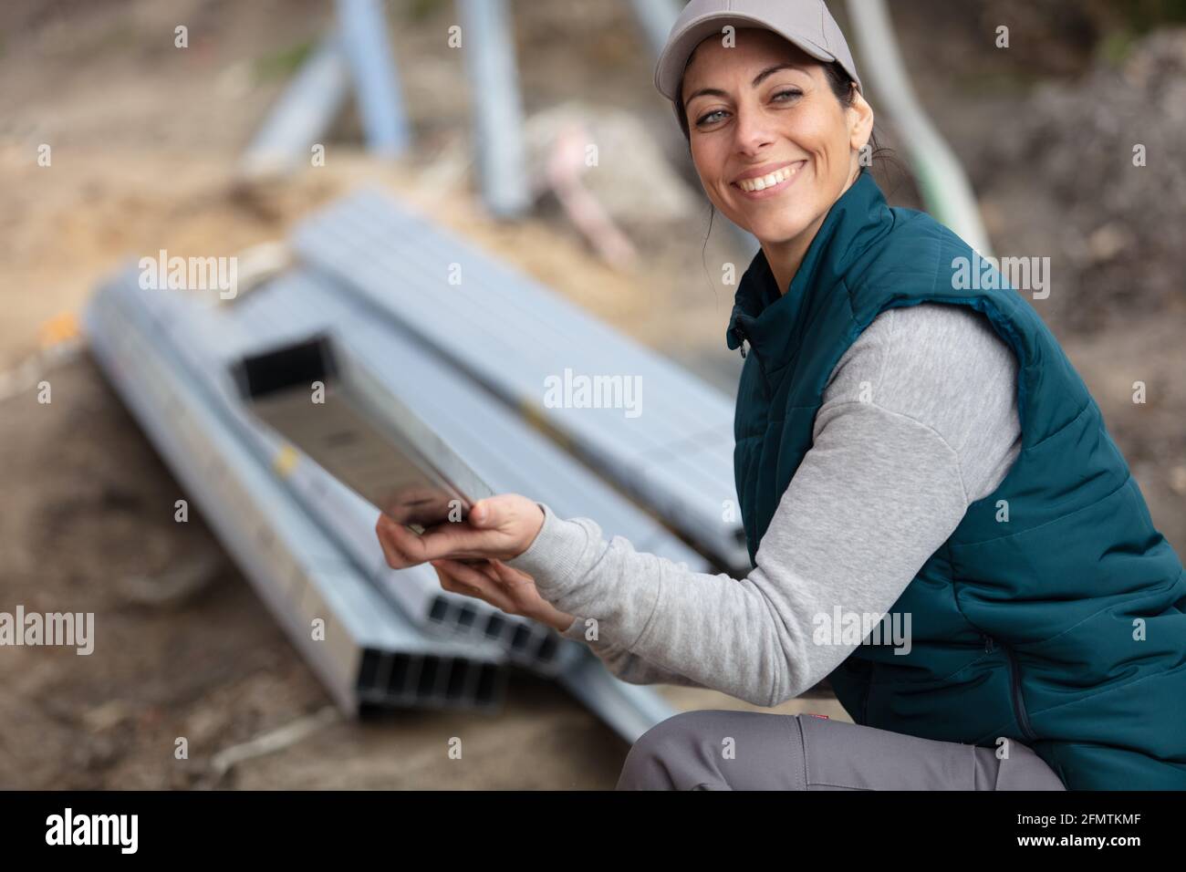 female labourers work on a city centre construction site Stock Photo ...