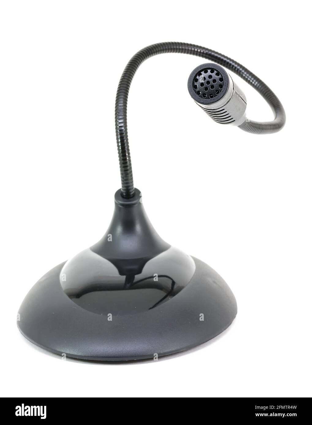 Wireless grey plastic microphone transmitter isolated over white ...