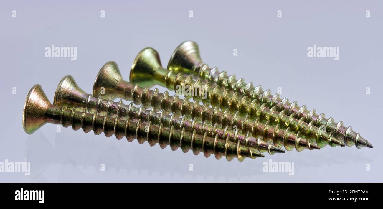 Tapping screws for wood conglomerate and conical head Stock Photo - Alamy