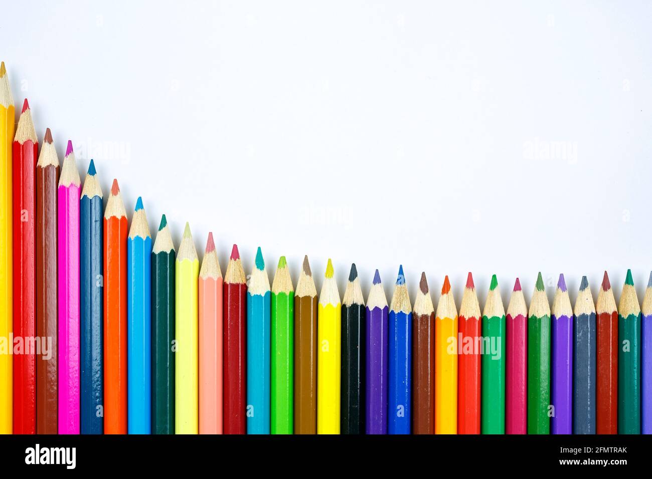 bunch of colored pencils isolated on white background Stock Photo - Alamy