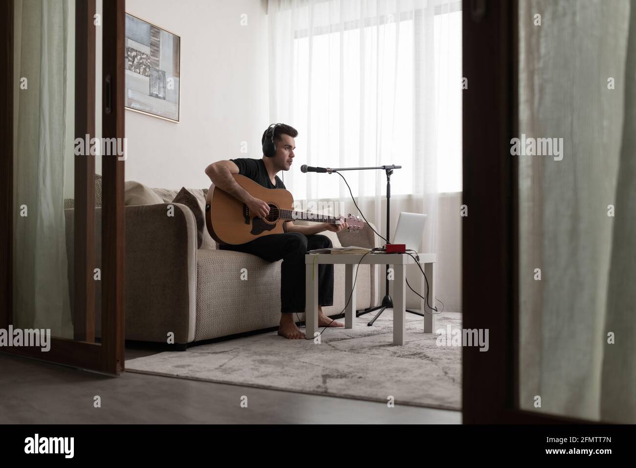 Guitarist recording music home hi-res stock photography and images - Alamy