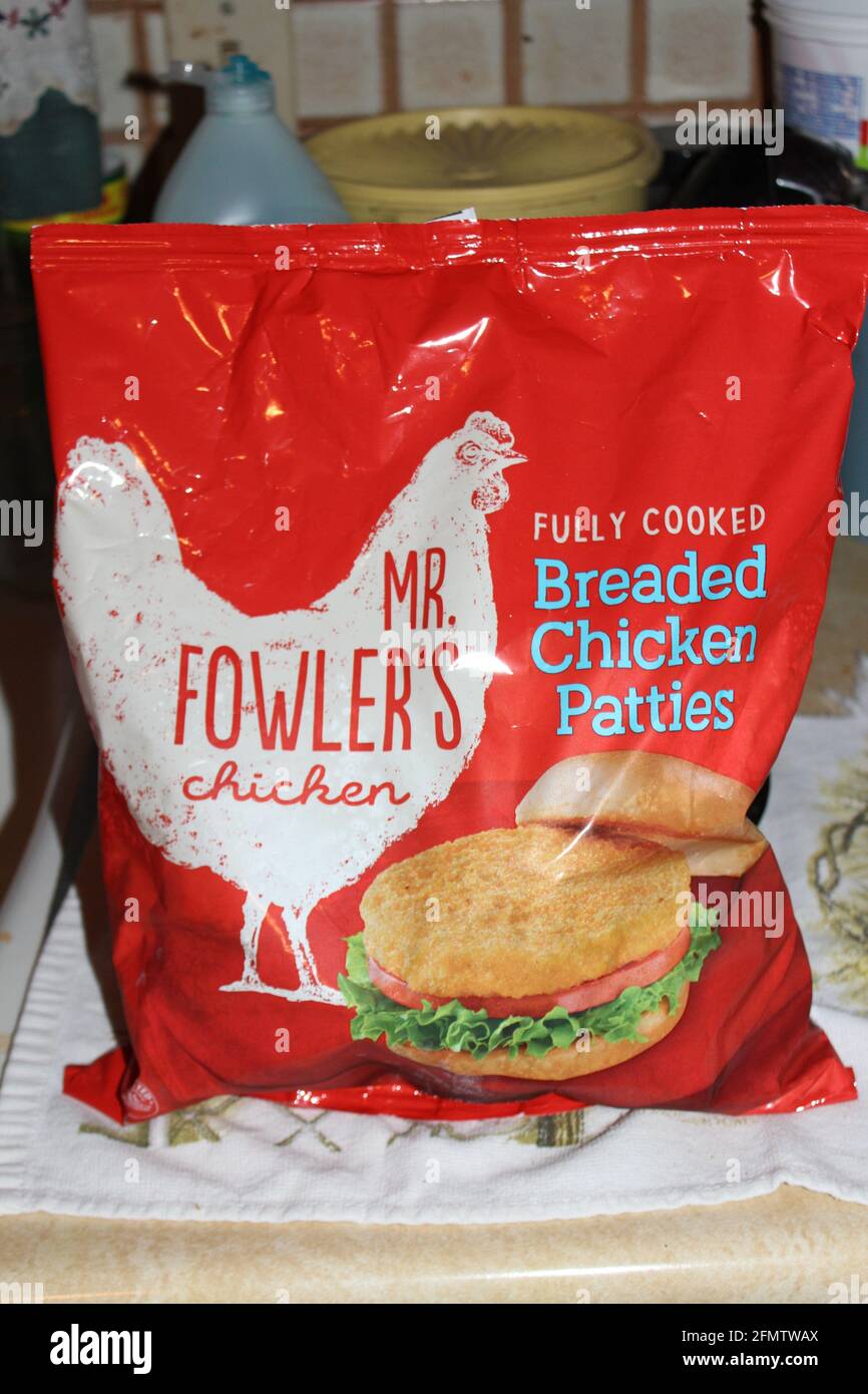 MR Fowlers Chicken Patties shot closeup in a red bag on a counter top ...