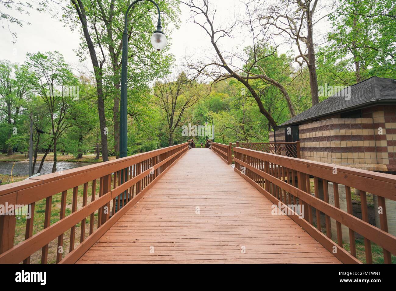 Bridge Over River in a beautiful park Stock Photo - Alamy