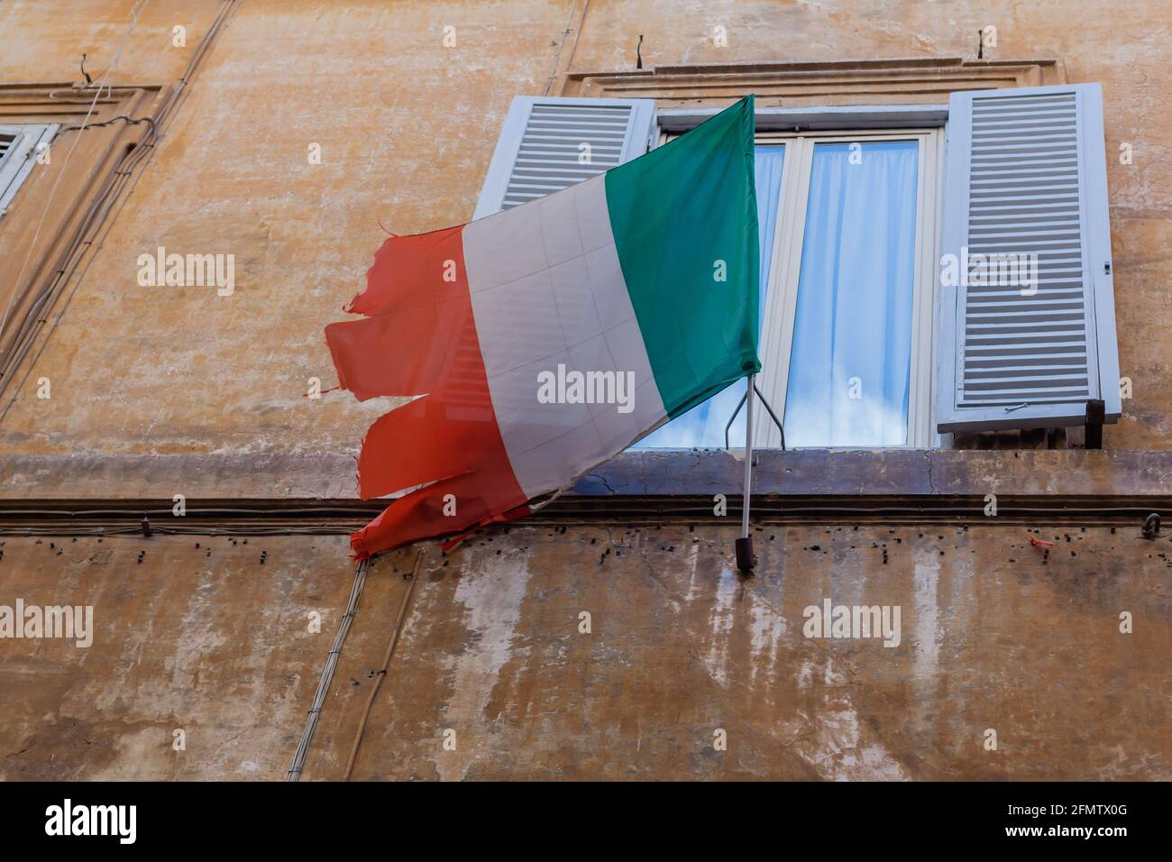 italian flag on the facade of the building Stock Photo - Alamy