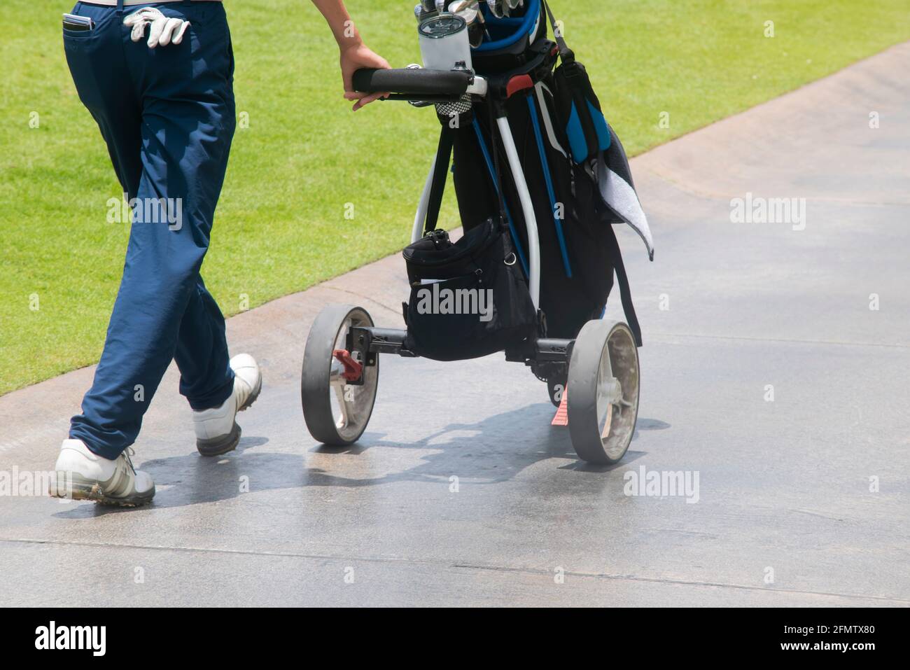 Man pushing buggy hi-res stock photography and images - Alamy