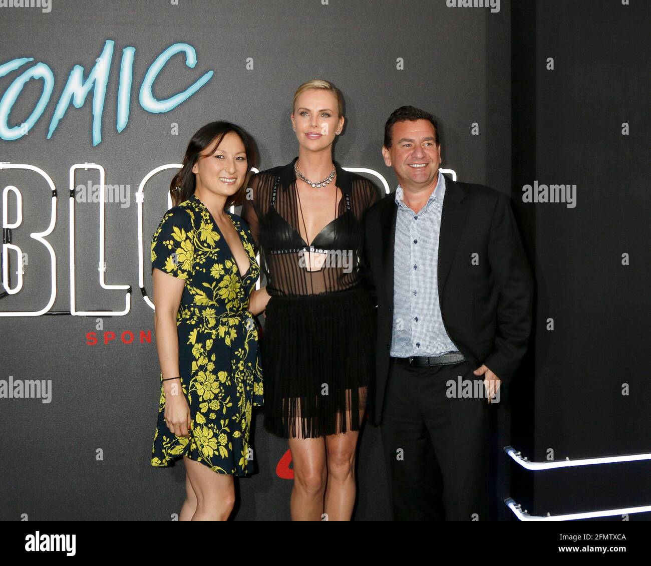 Aj dix charlize theron beth kono hi-res stock photography and images ...