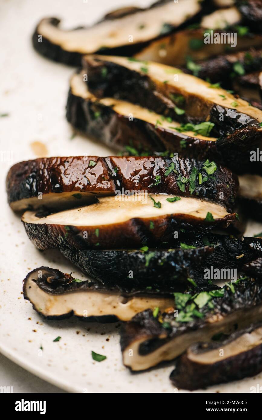 Sliced grilled portobello mushrooms with garlic and parsley marinade ...