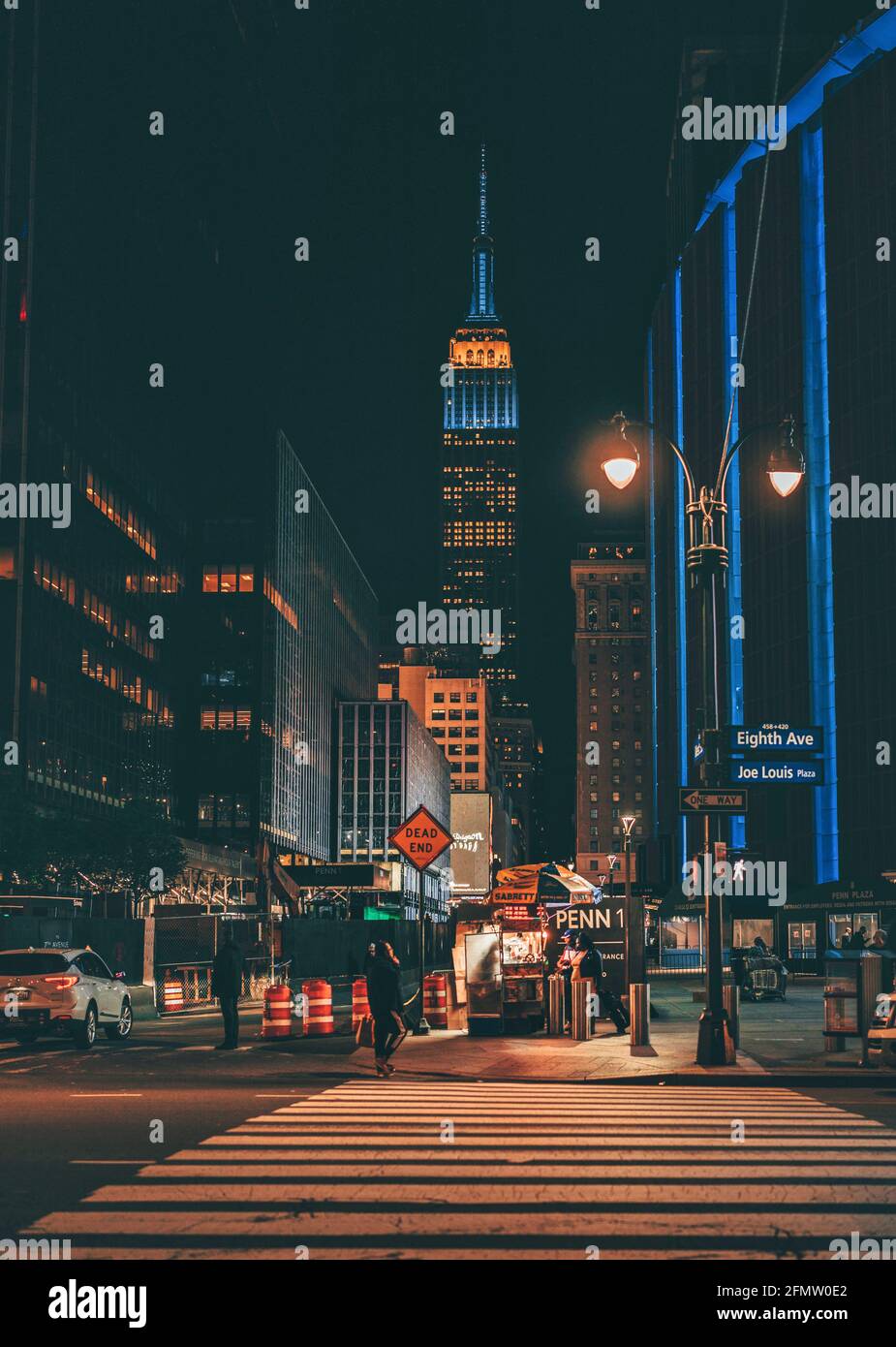 Traffic light and road block block at night night hi-res stock ...