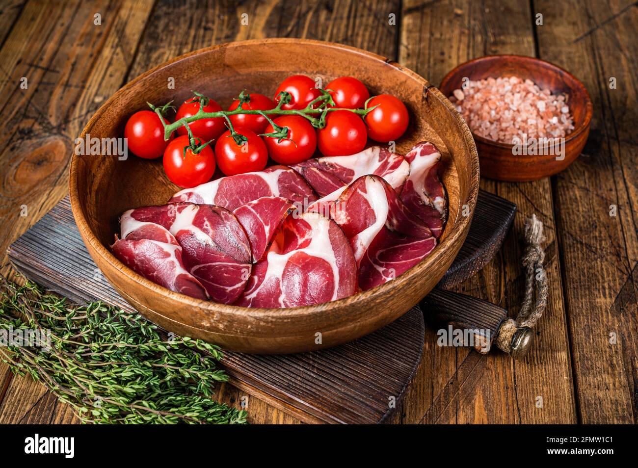 Italian sliced cured coppa ham with spices. wooden background. Top view ...