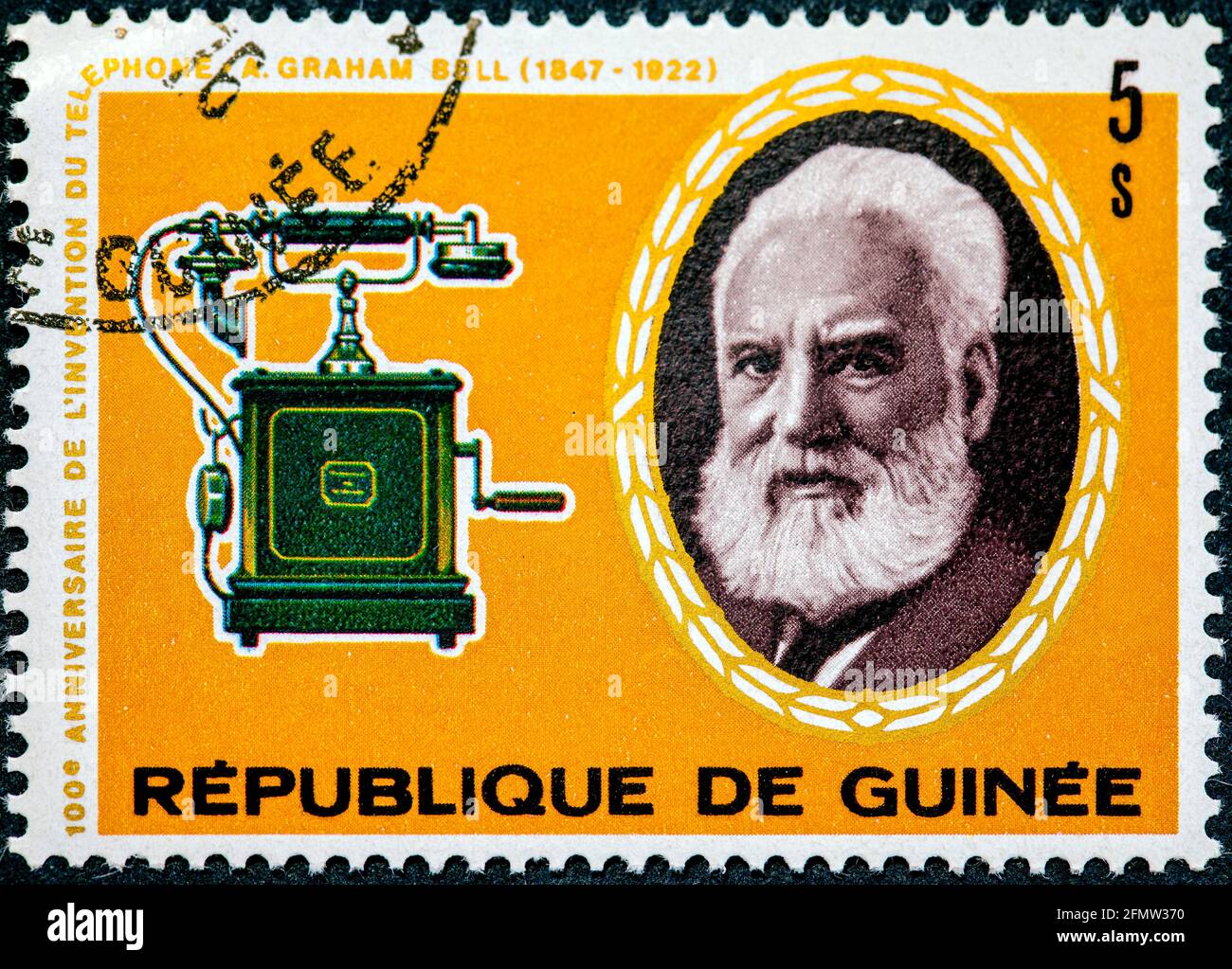 GUINEA - CIRCA 1976: A stamp printed by Guinea shows Alexander Graham ...
