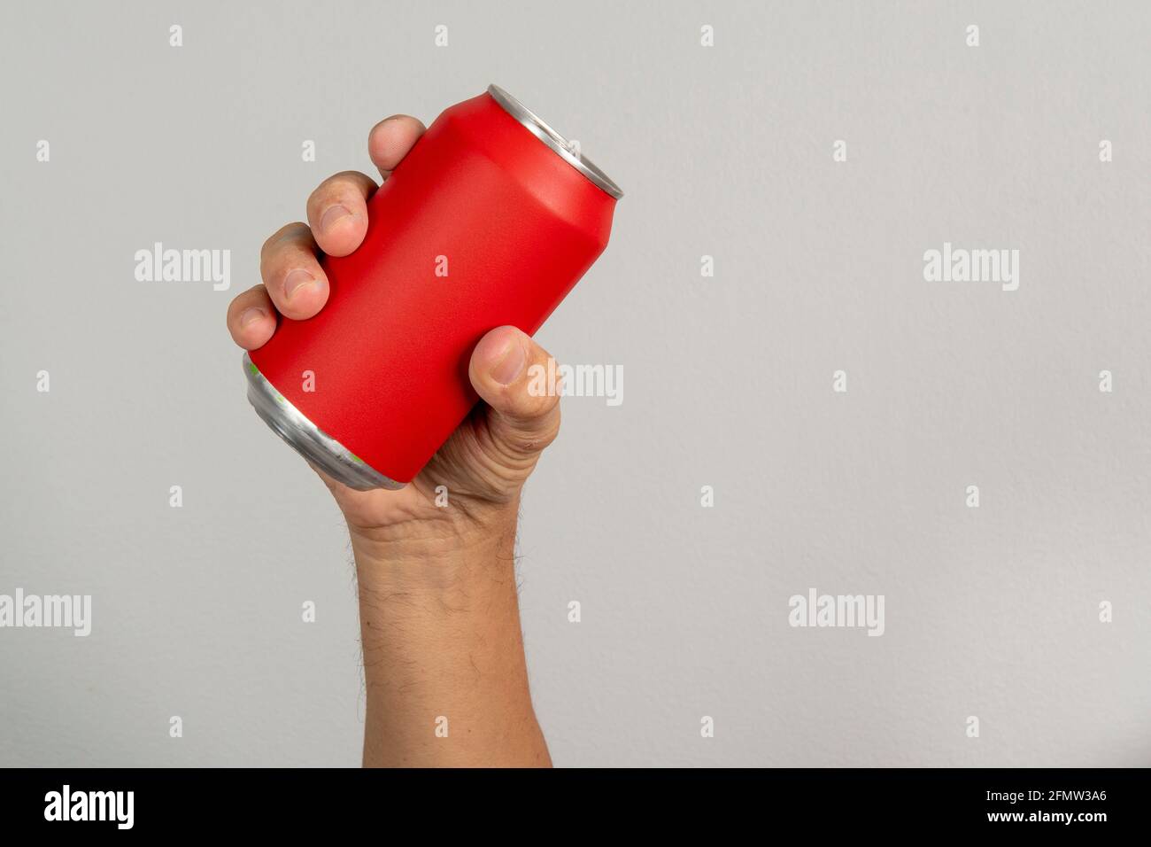 Hand holding can alcohol hi-res stock photography and images - Alamy