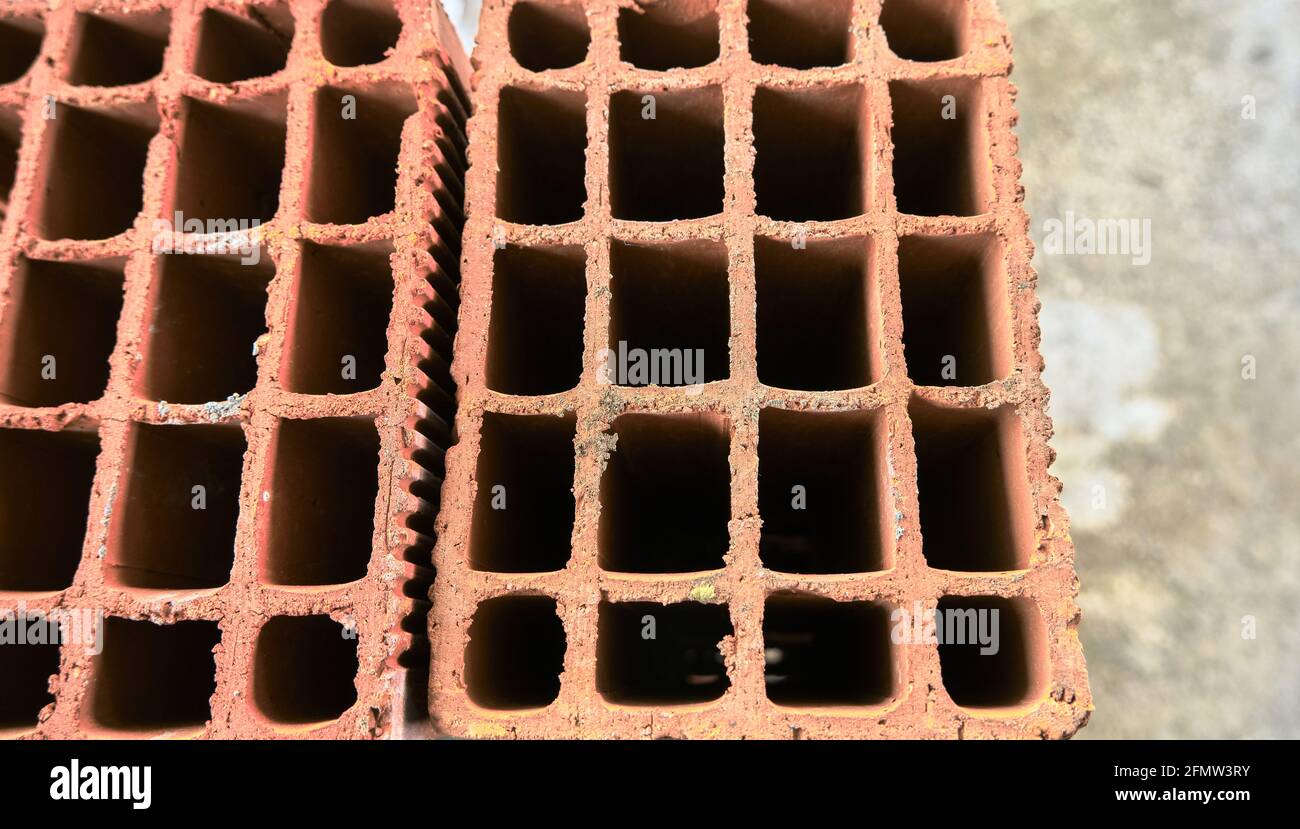 groups of red bricks standing side by side Stock Photo - Alamy