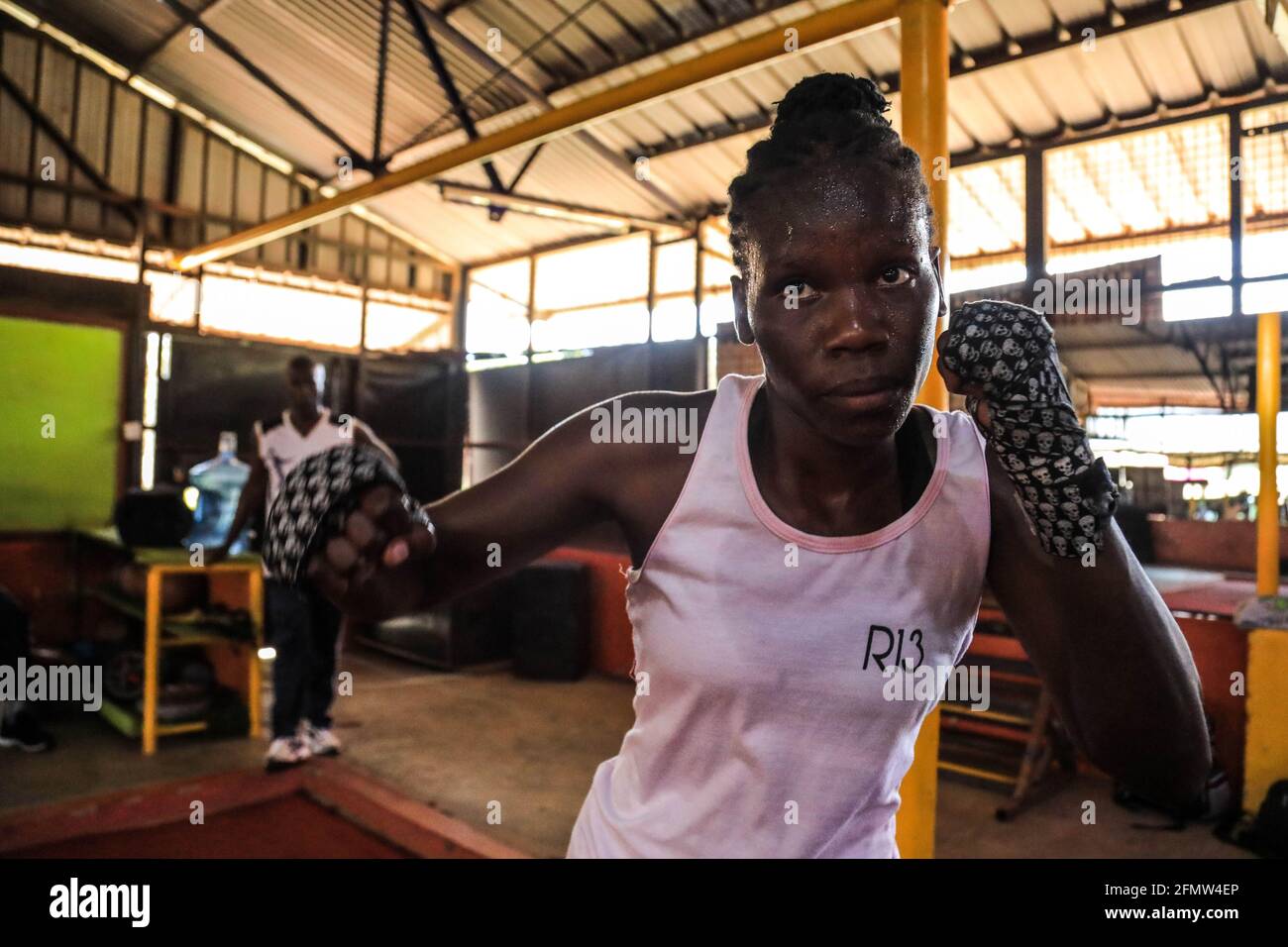 Kampala. 30th Apr, 2021. Catherine Nanziri practices punches during a ...