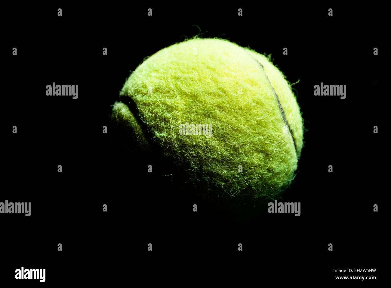 High Contrast Isolated Tennis Ball in Shadow Stock Photo - Alamy