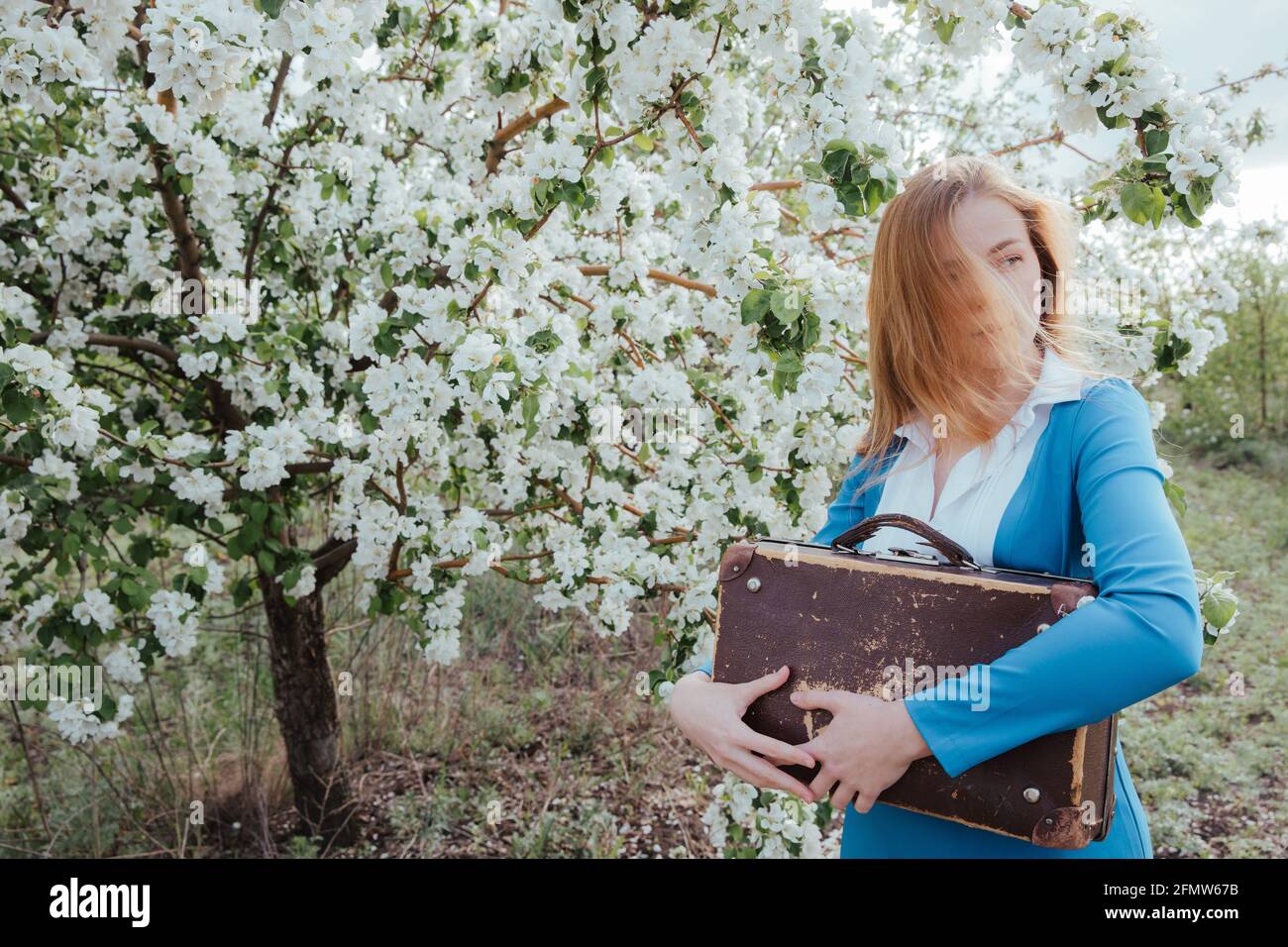 Hair covers the young woman's face Stock Photo - Alamy