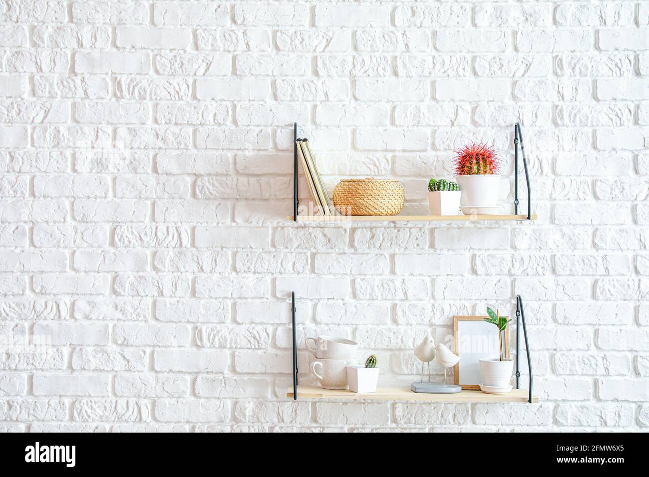 Hanging shelves on brick wall hi-res stock photography and images - Alamy