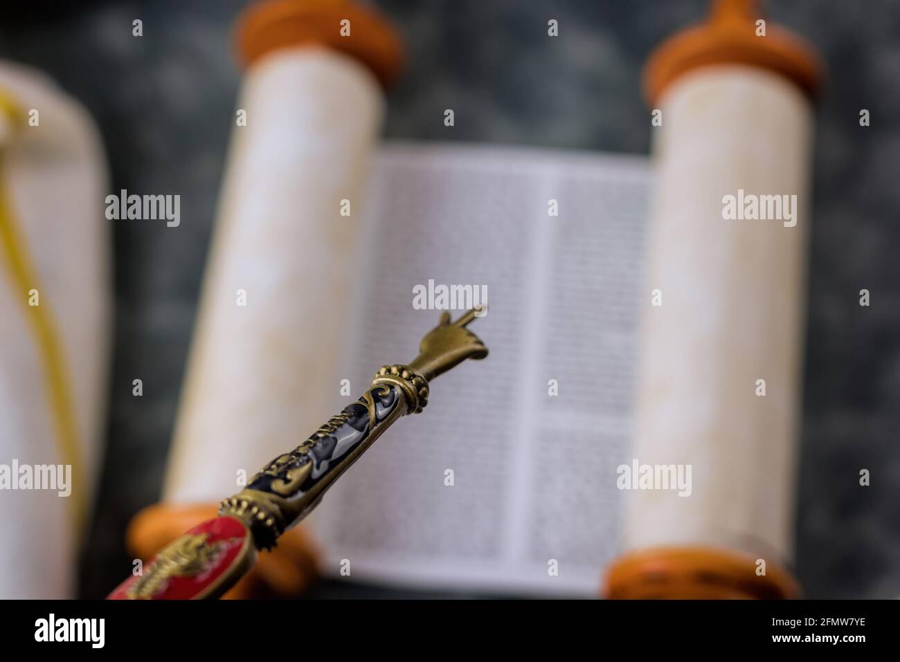 Jewish synagogue Judaic religion of Torah Scrolls with the pointer for ...