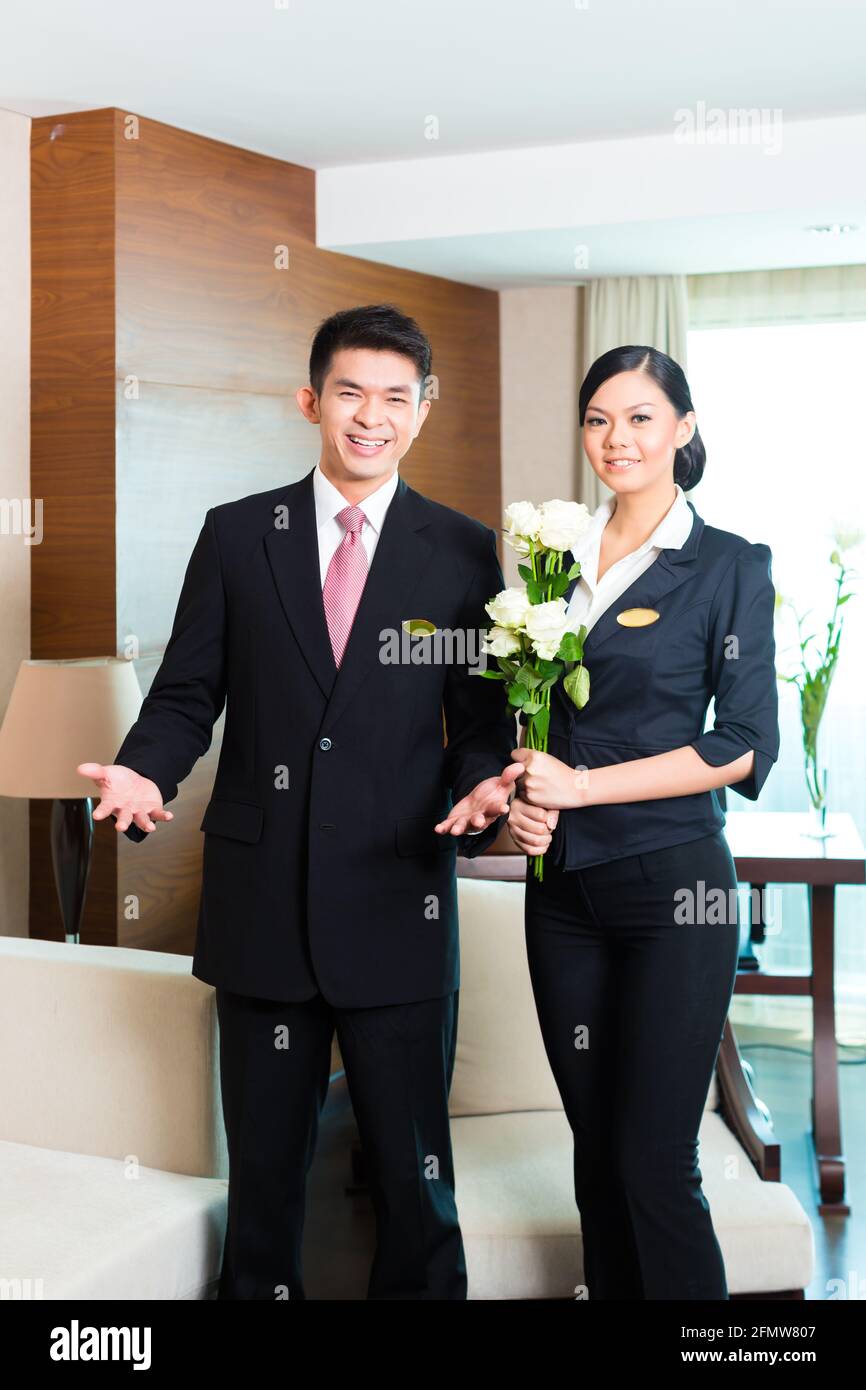 Hotel Manager or director and supervisor welcome arriving VIP guests ...
