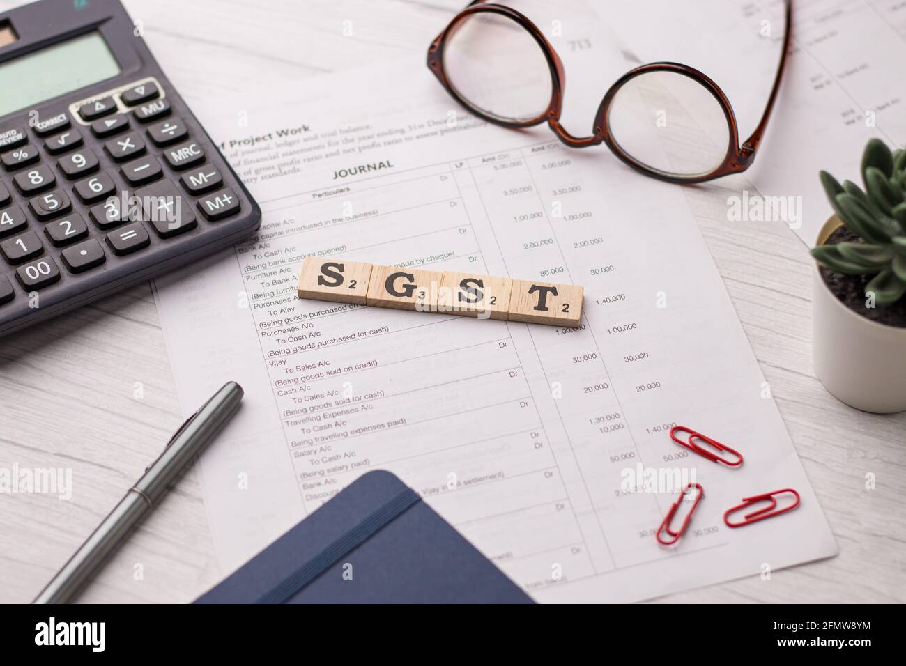 Assam, india - March 30, 2021 : Word GST written on wooden cubes stock ...