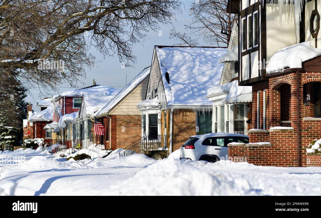 Franklin Park, Illinois, USA. A series of homes along a suburban street on a winter day ...