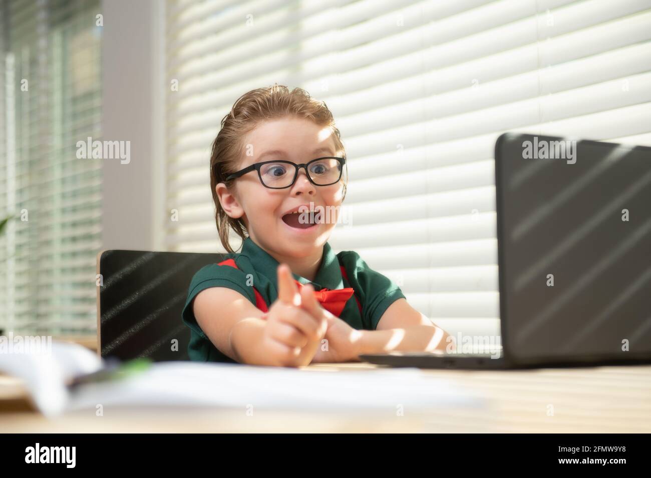 Smart school pupil kid virtual distance learning online, watching ...