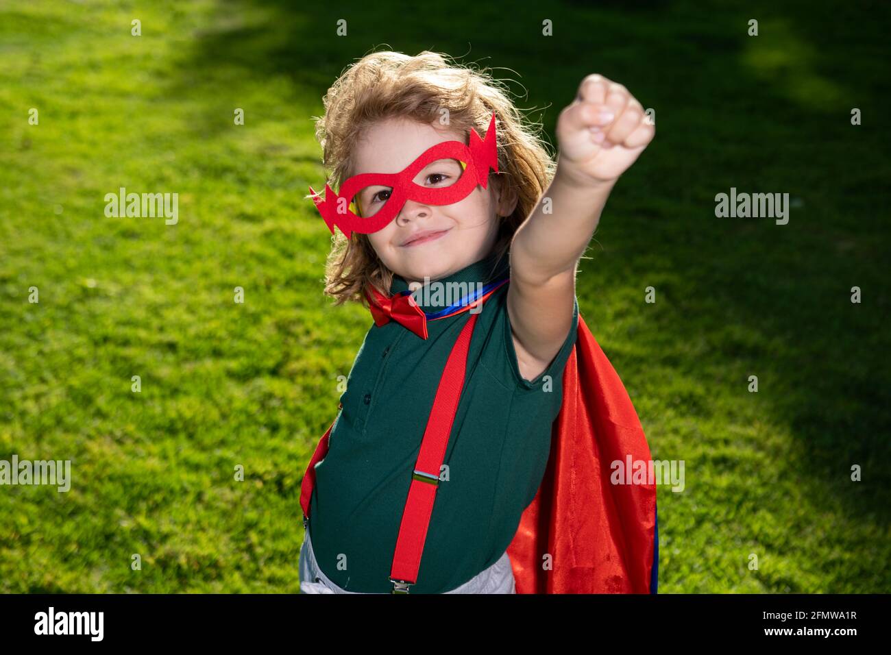 Boy With Cape And Mask