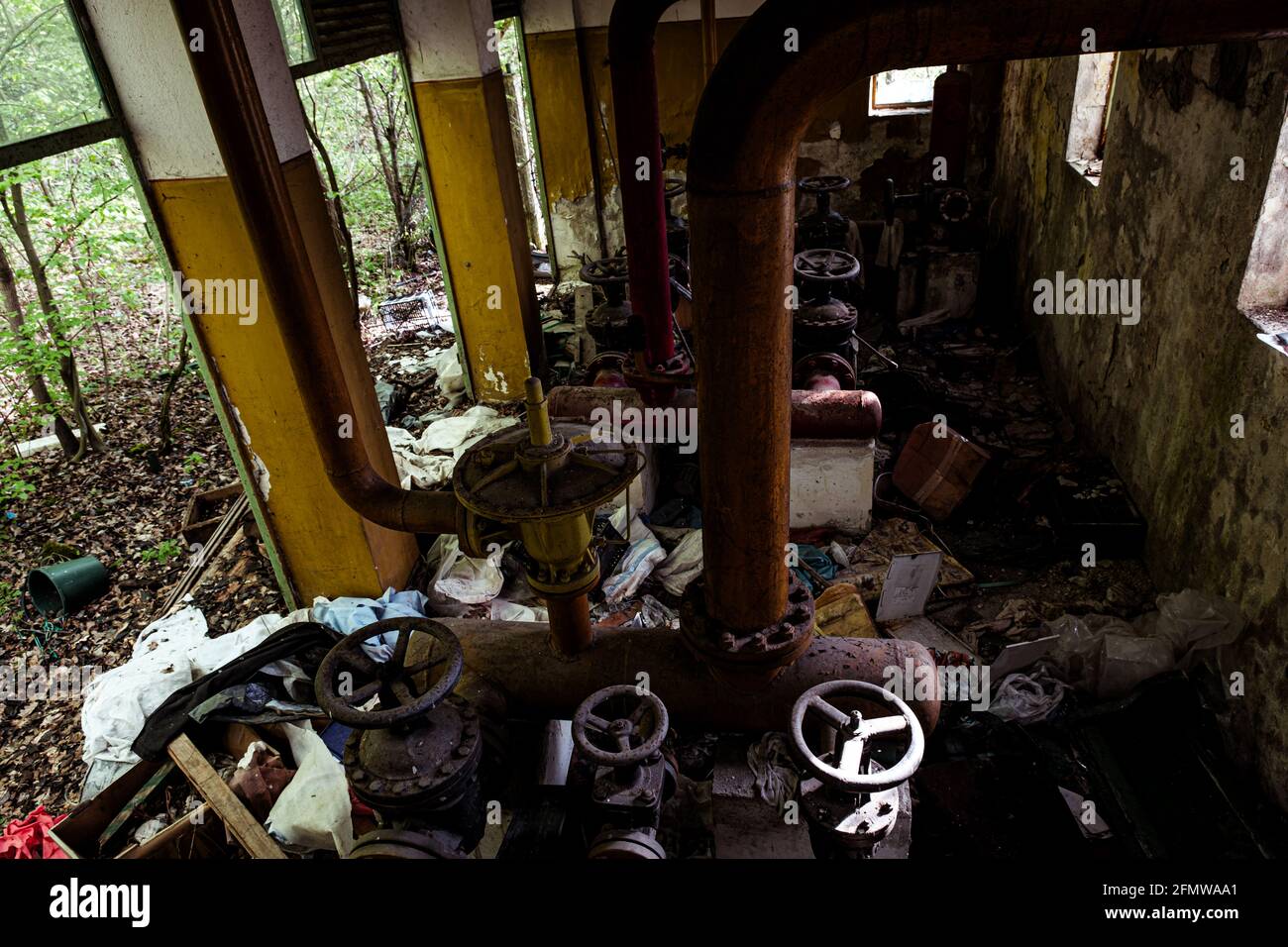 abandoned industrial area with pipes and taps Stock Photo - Alamy