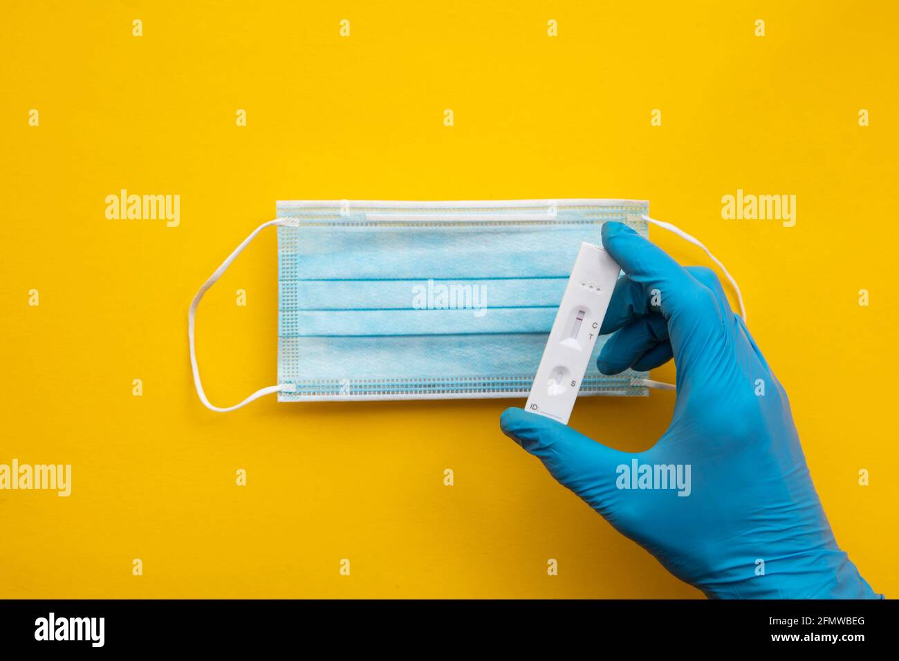 Coronavirus lateral flow home testing kit with a face mask Stock Photo ...