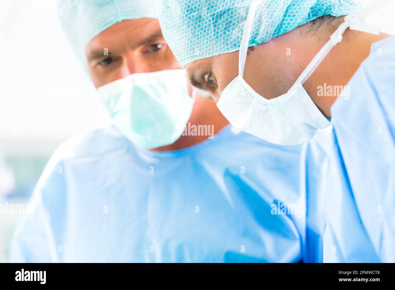 Hospital - surgery team in the operating room or Op of a clinic ...