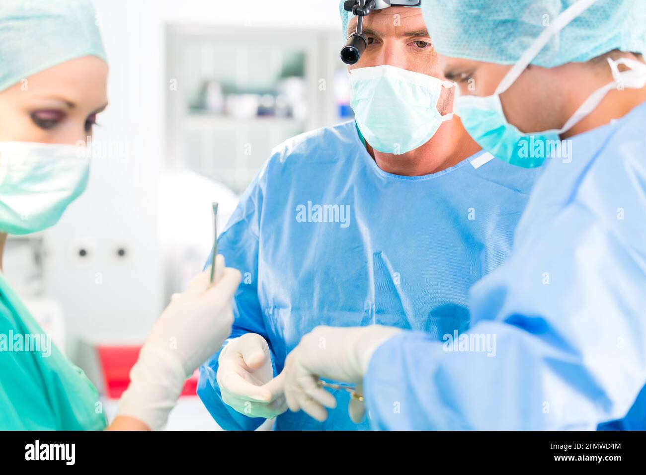 Hospital - surgery team in the operating room or Op of a clinic ...