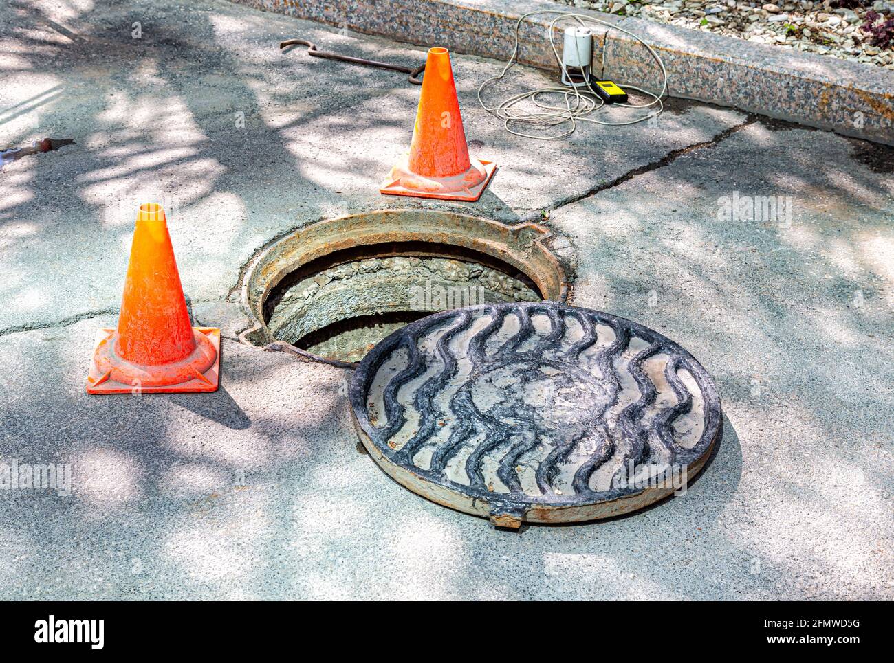 Metal utility service cover hi-res stock photography and images - Alamy