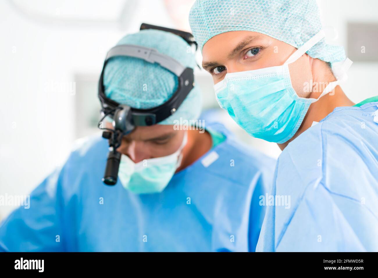 Hospital - surgery team in the operating room or Op of a clinic ...