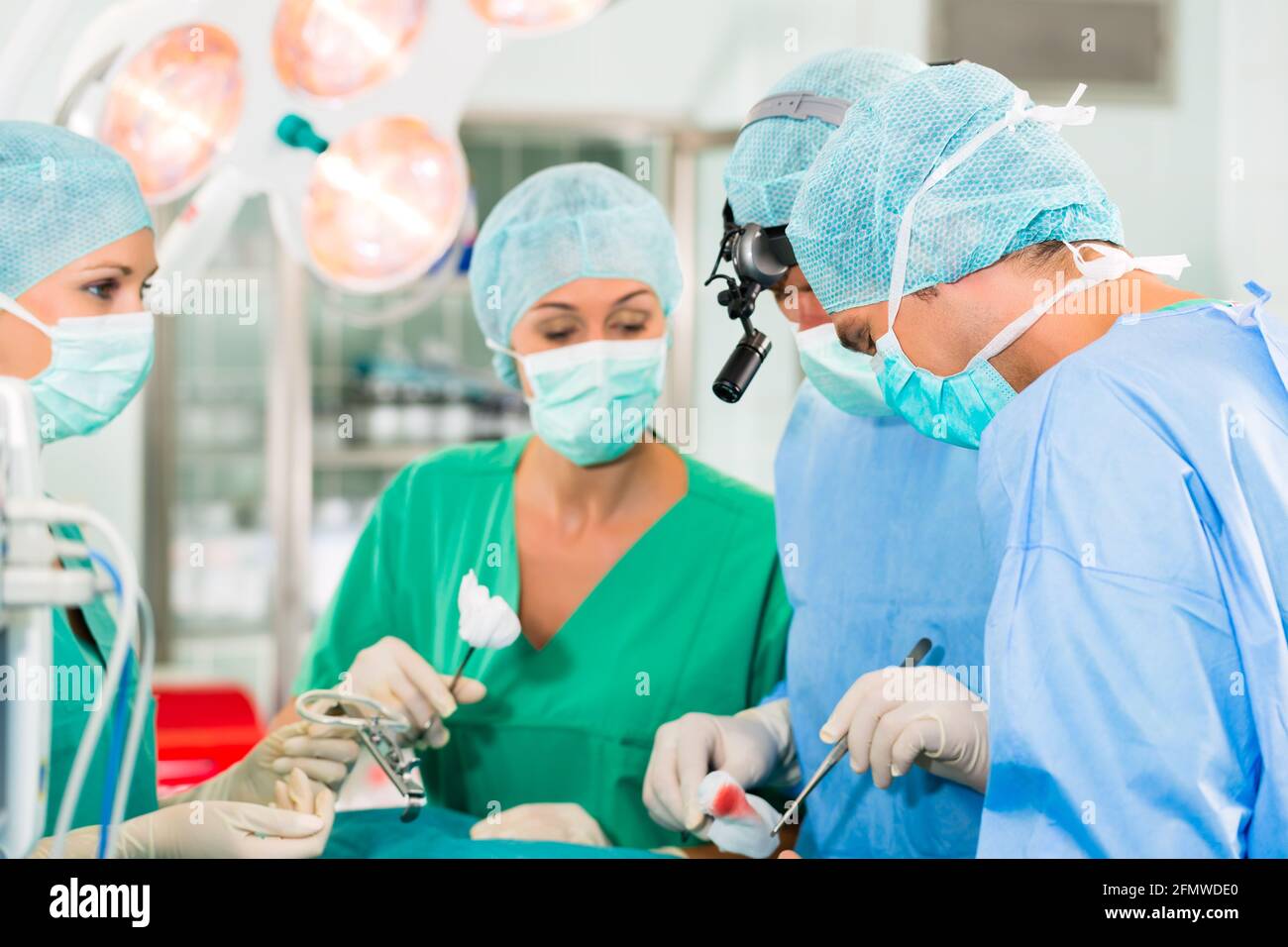 Hospital - surgery team in the operating room or Op of a clinic ...