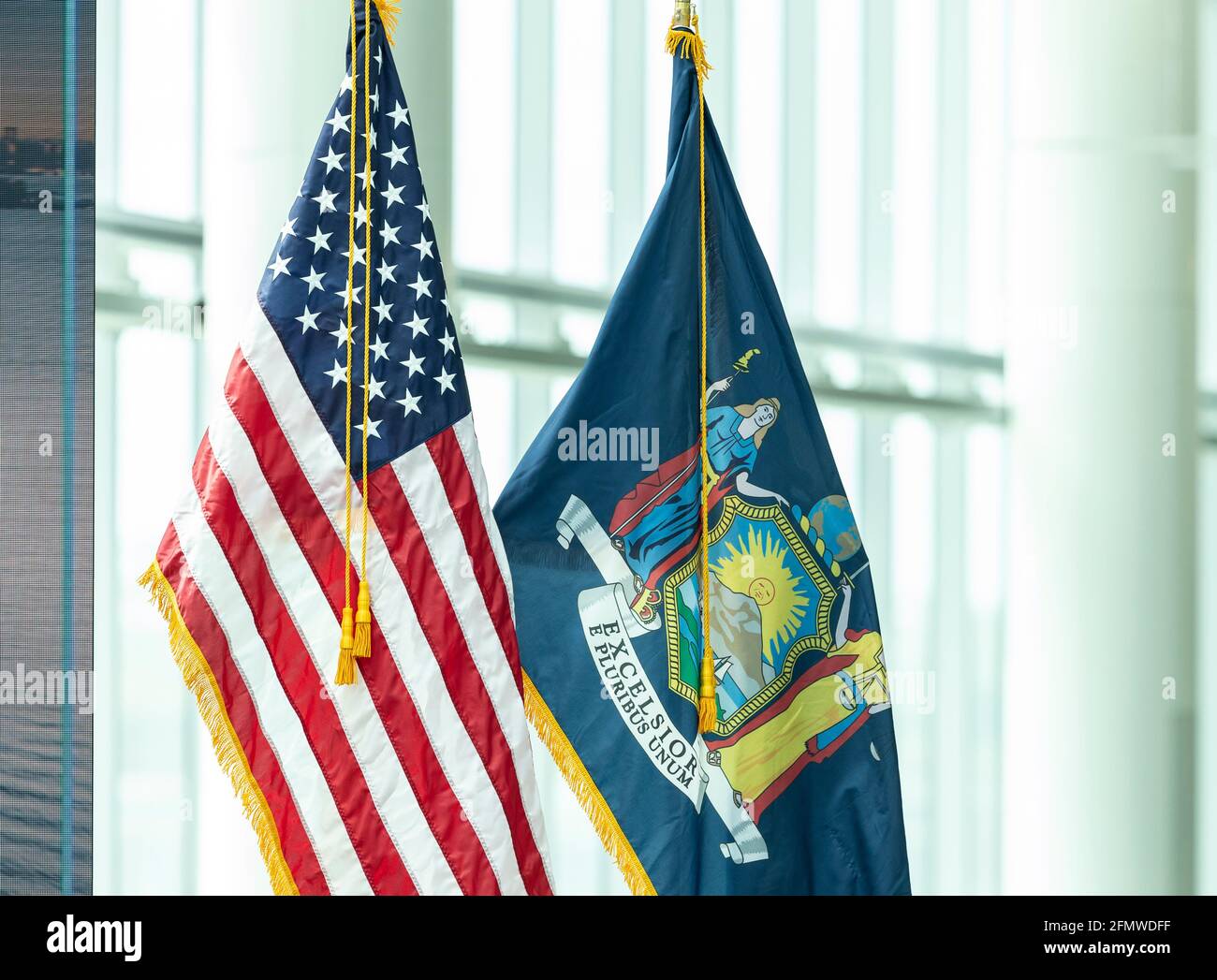 New York, NY - May 11, 2021: American and New York State flags seen at ...