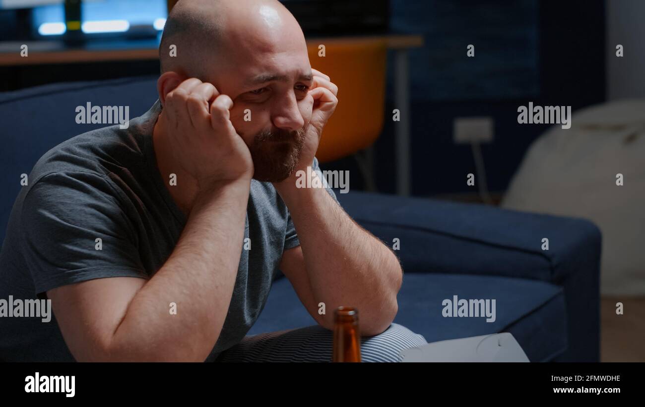 Traumatised, frustrated stressed depressed man suffering from break up ...