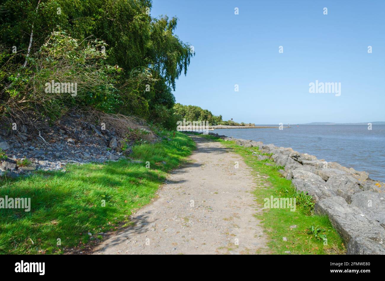High tide at Flint Foreshore on the River Dee in North Wales following ...