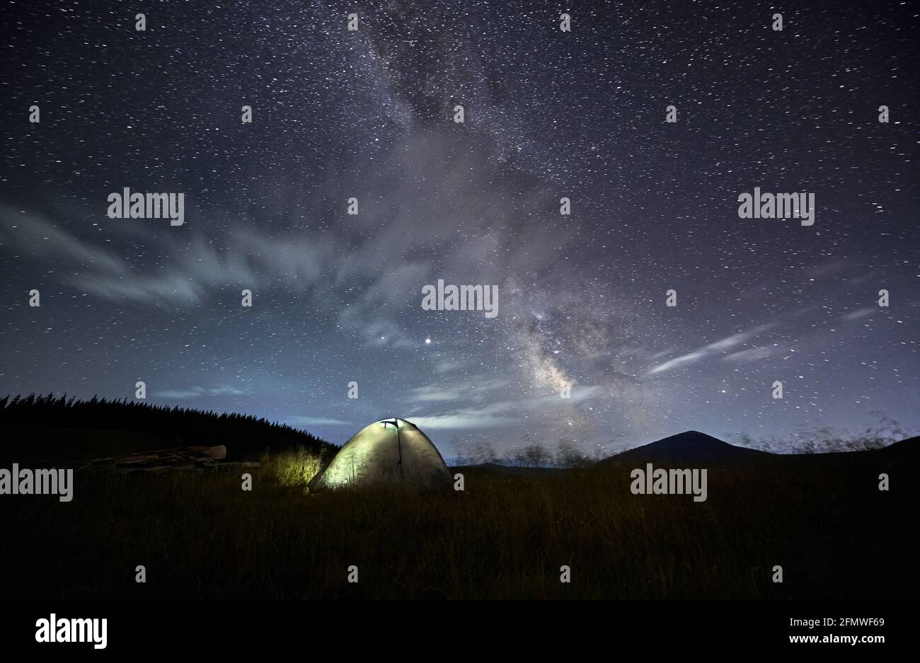 Front view of beautiful landscape of campsite in mountains. Scenery of ...
