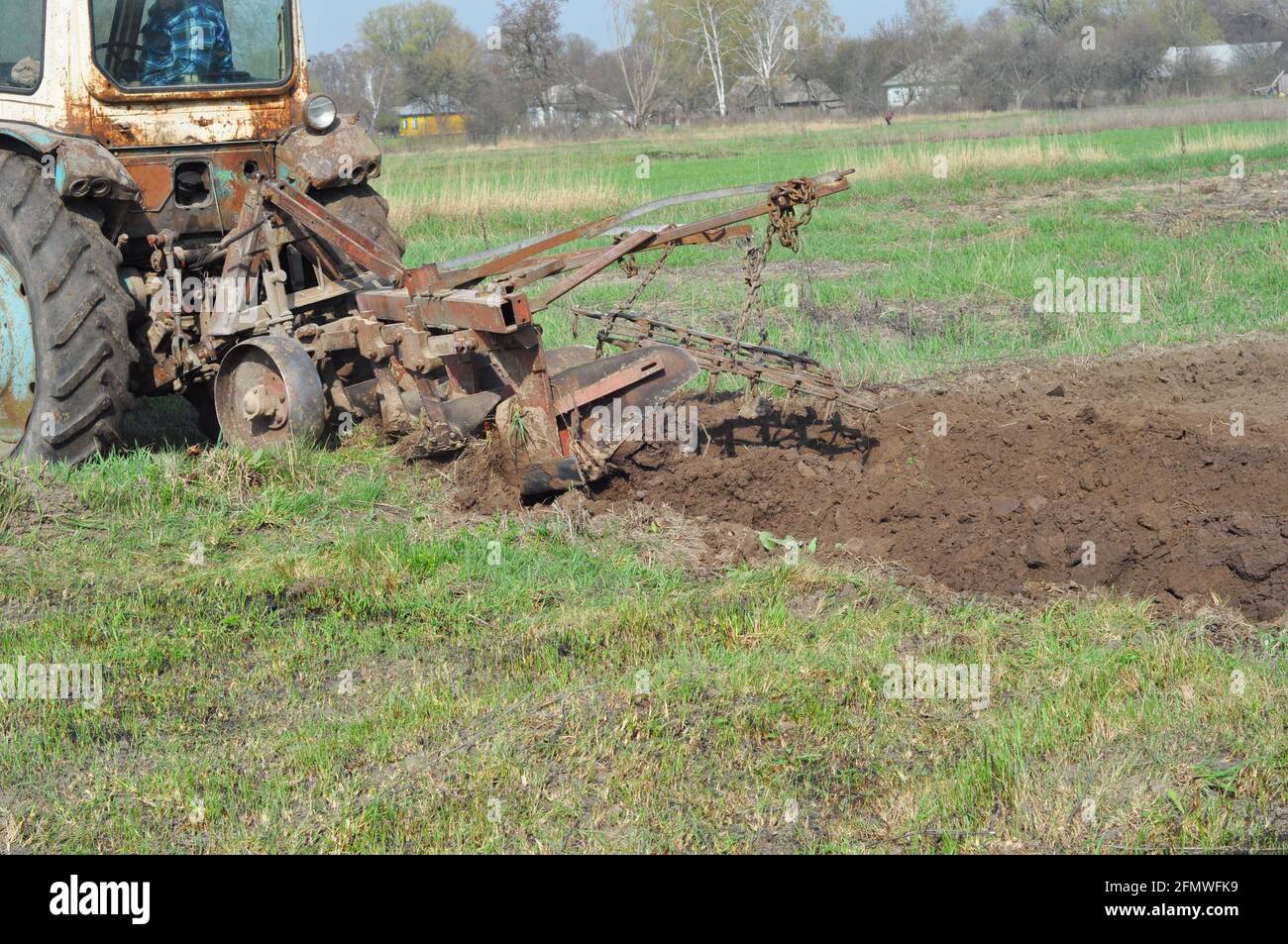 Tilling the field hi-res stock photography and images - Alamy