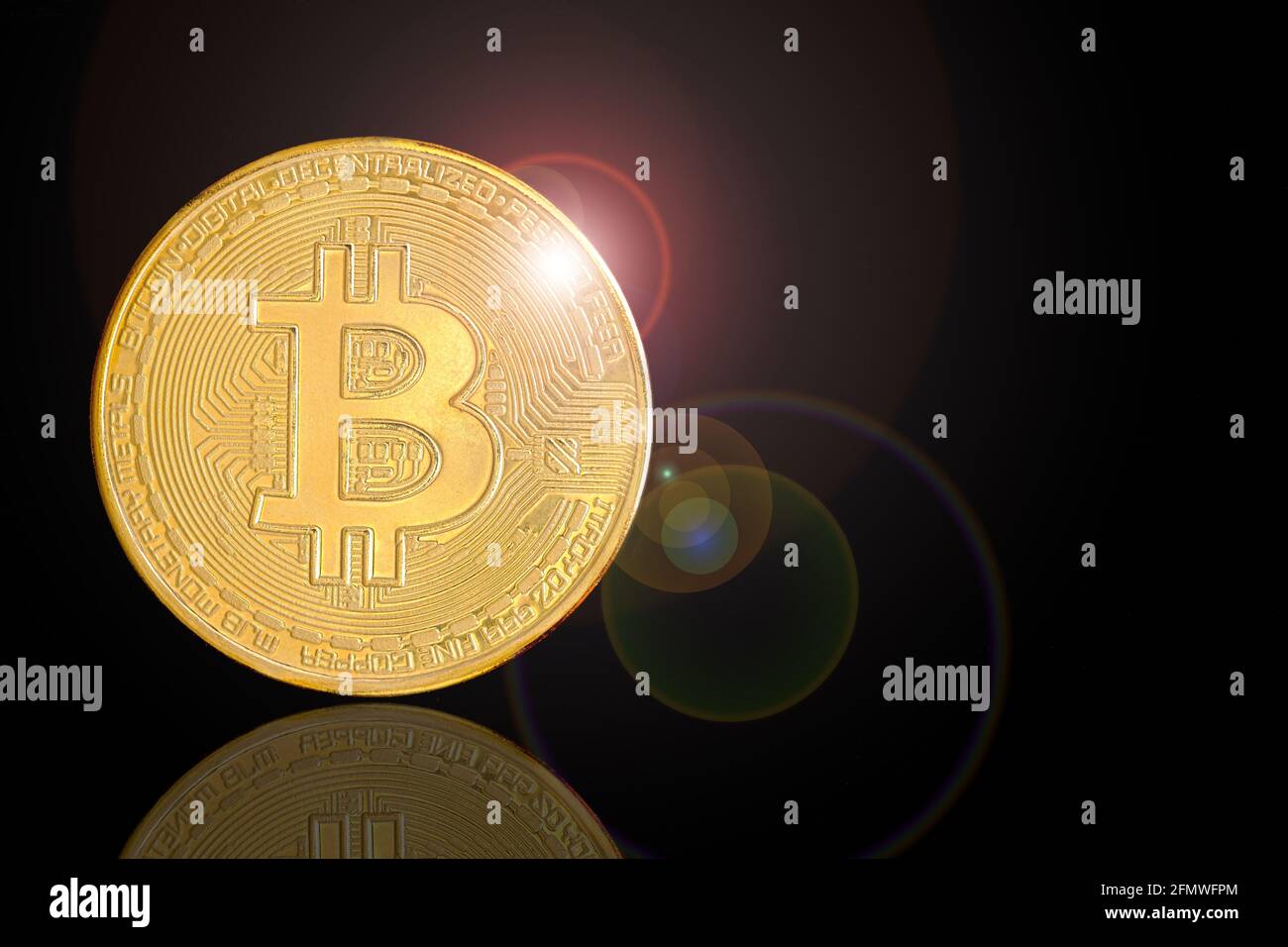 Bitcoin raising concept isolated on black background. Golden bitcoins ...