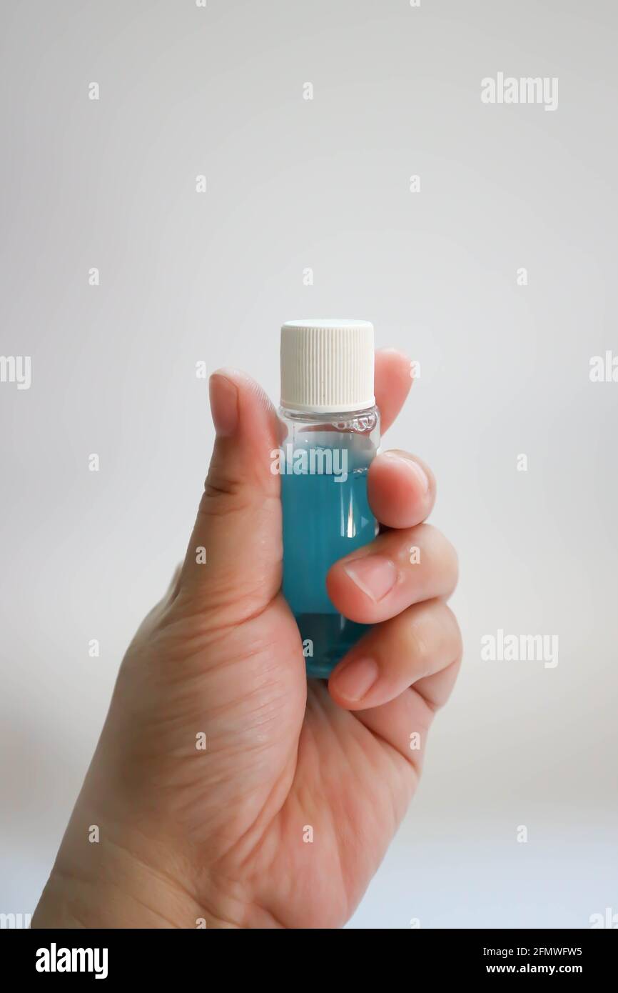 alcohol, a bottle of alcohol or holding alcohol Stock Photo - Alamy