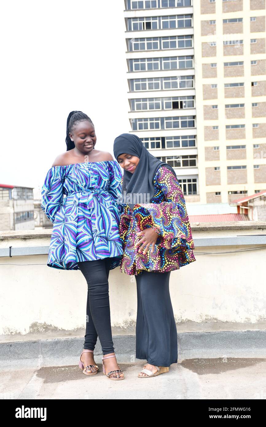 Beautiful African dark fashion designer poses on roof top Stock Photo ...