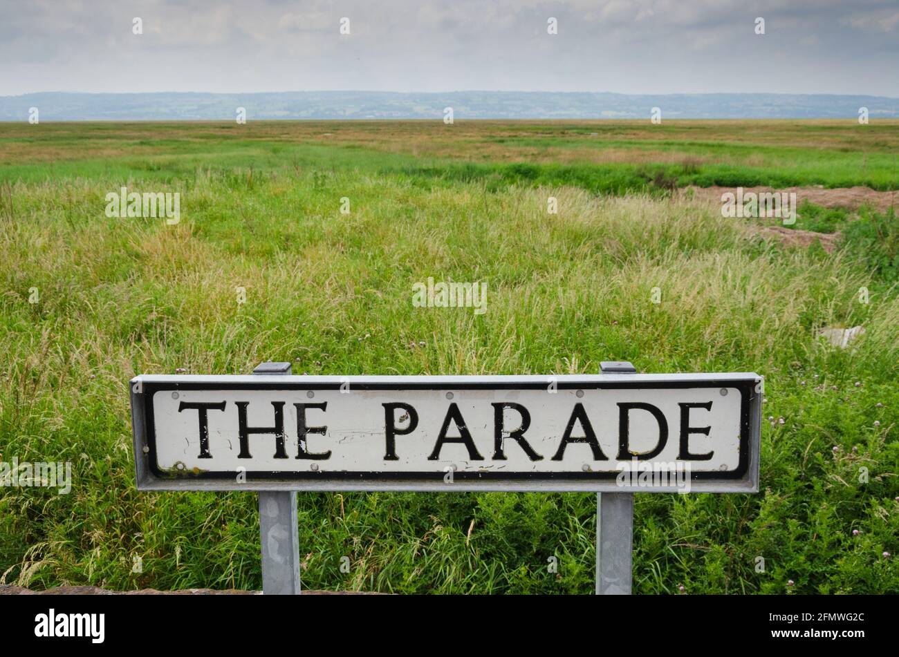 Road name sign for a street called The Parade, in the Wirral village of ...