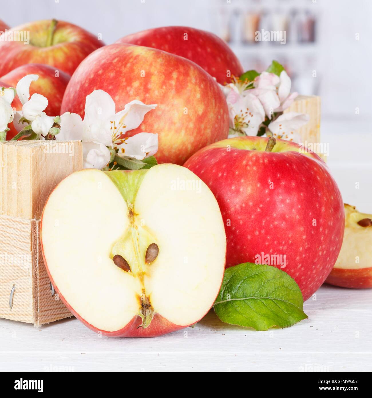 Apples fruits red apple fruit square box on wooden board with leaves ...