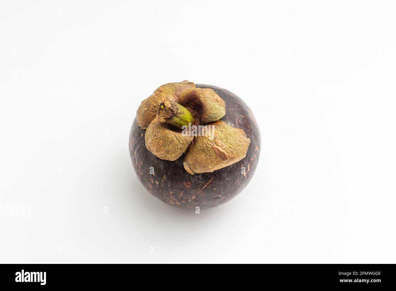 ripe mangosteen isolated on white background Stock Photo - Alamy