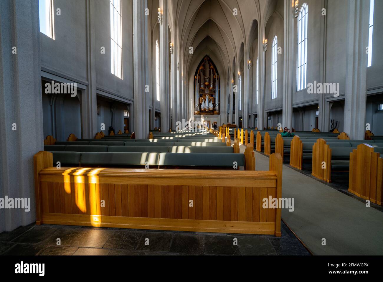 REYKJAVIK, ICELAND - April 02, 2019 Tall Columns Windows Wooden Organ ...