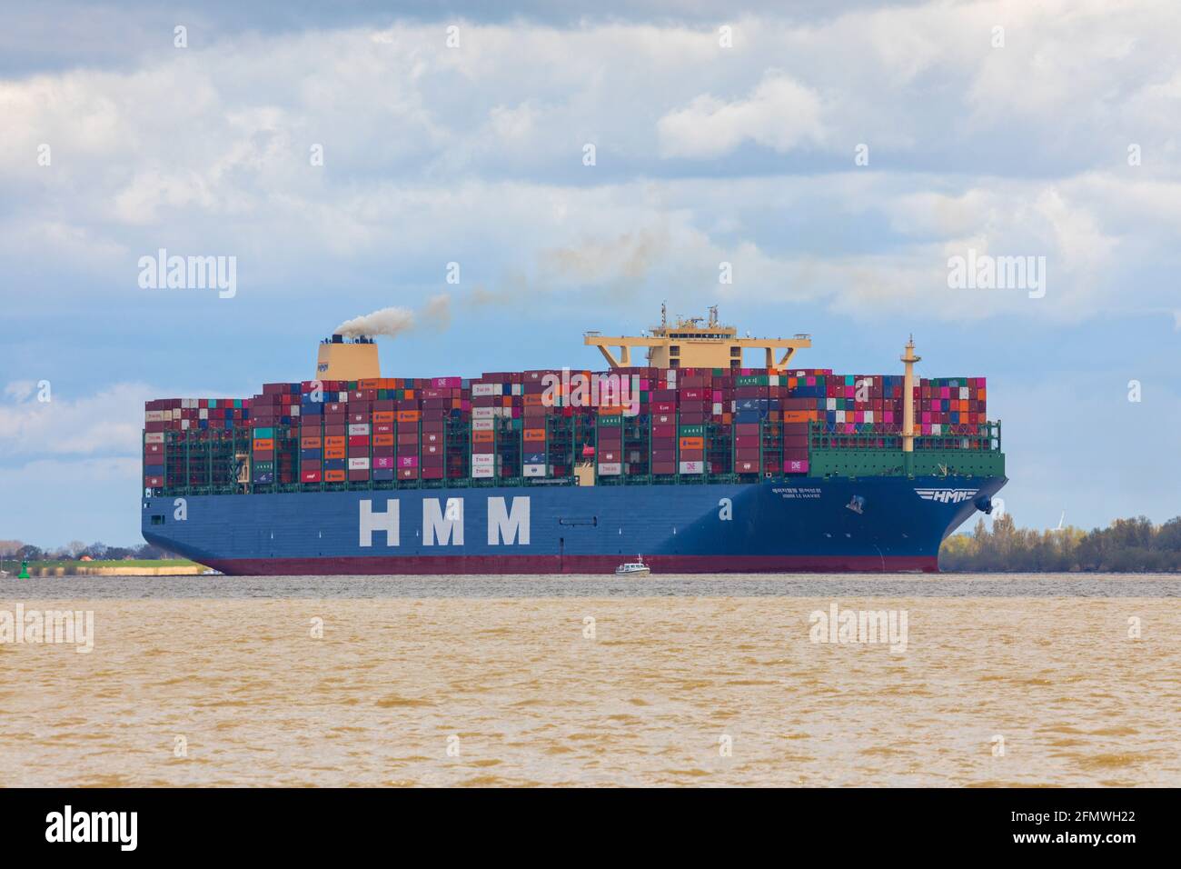 Stade, Germany – May 7, 2021: HMM LE HAVRE, with her sister ships of the Megamax-class the ...